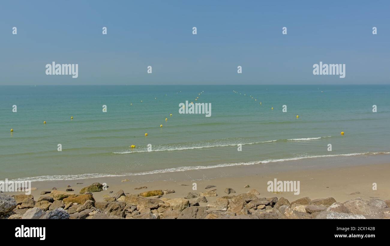 Rows of yellow buoys in the north sea Stock Photo - Alamy