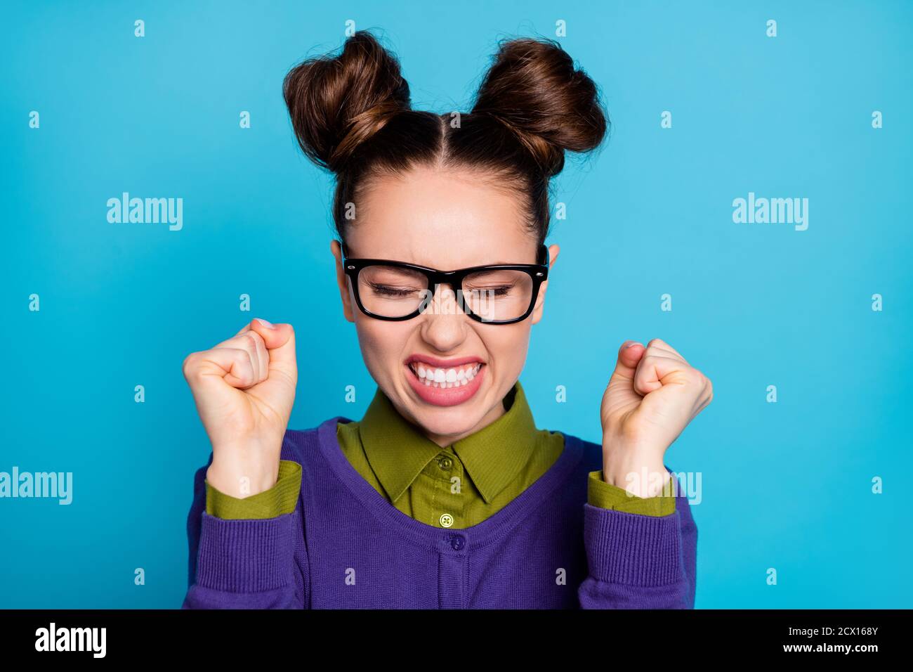 Closeup photo of attractive angry student lady funny buns eyes closed ...