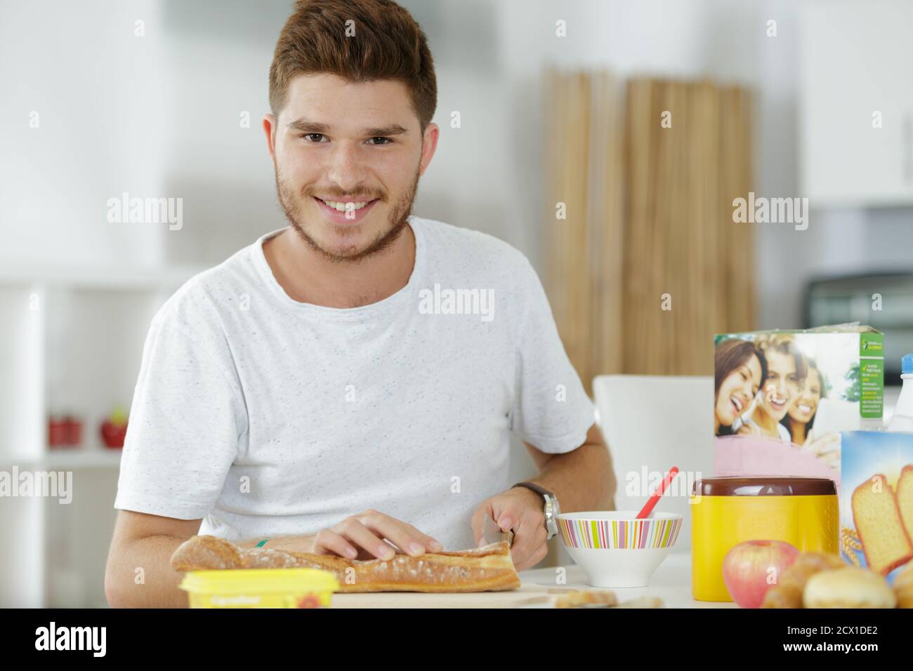 a man making a sandwhich Stock Photo - Alamy