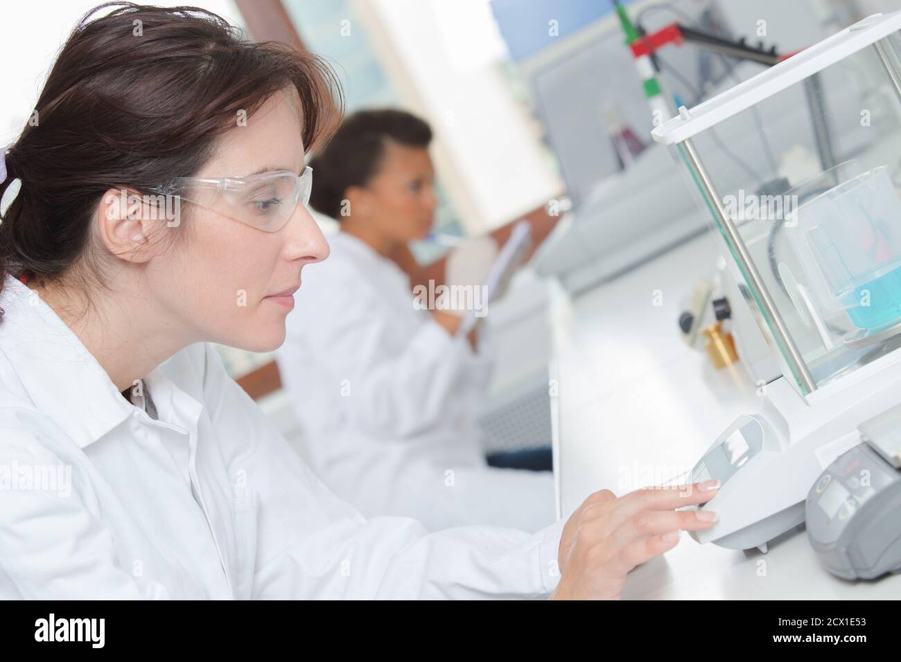 beautiful female lab worker Stock Photo - Alamy