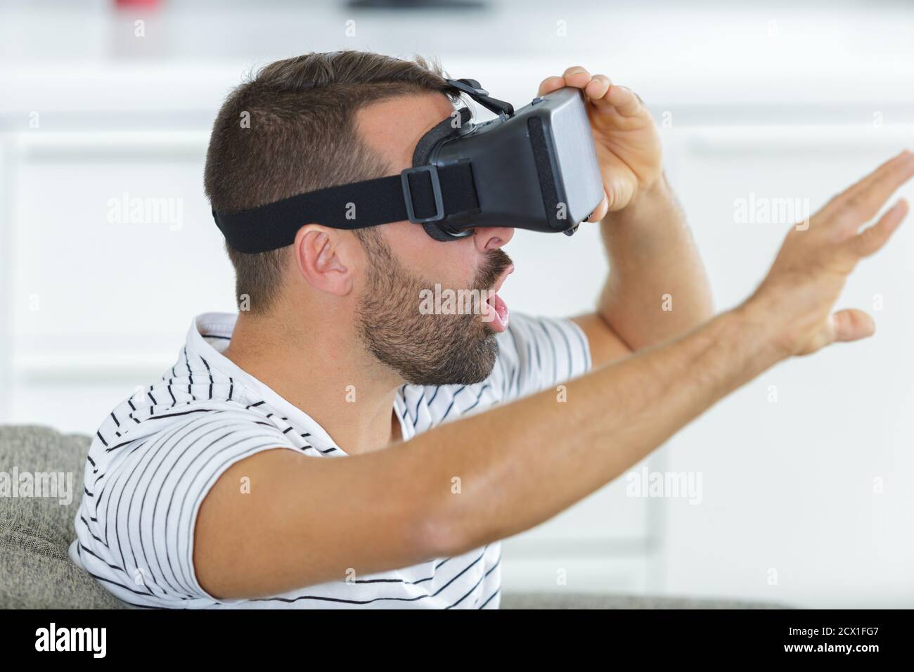 Helmet virtual man hands hi-res stock photography and images - Alamy