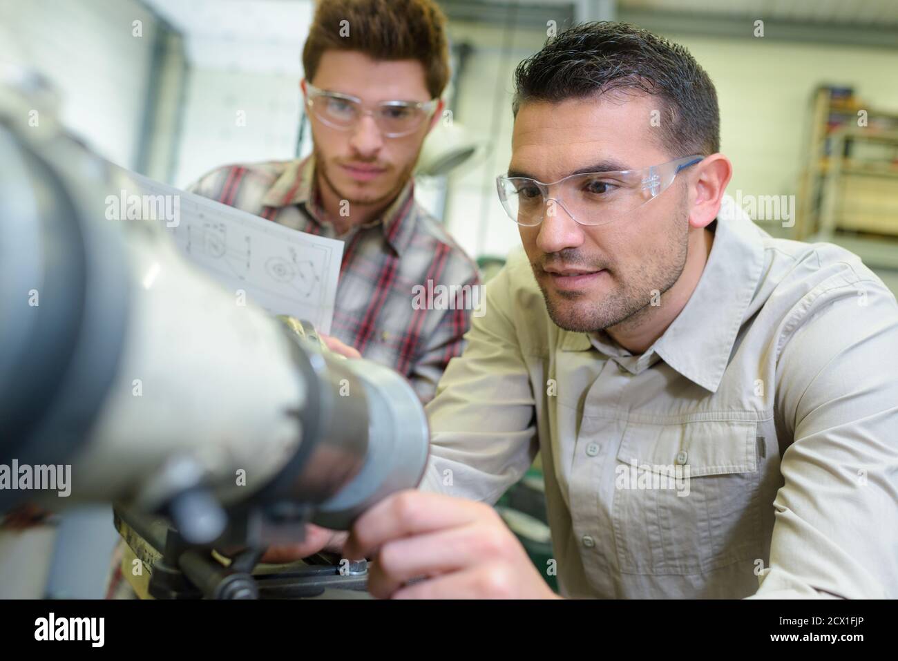 Posing mechanics hi-res stock photography and images - Alamy