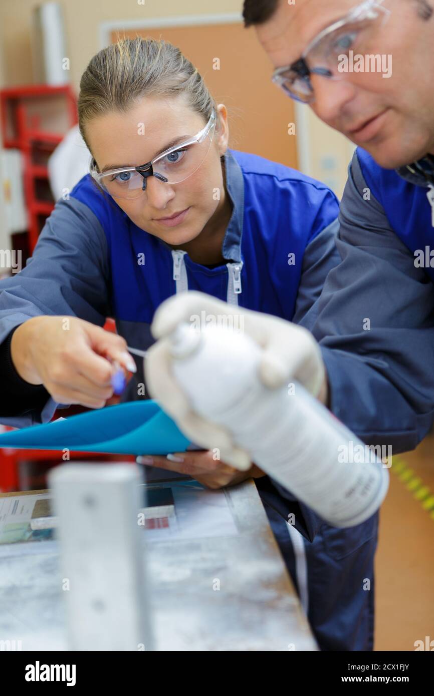 Advising colleague hi-res stock photography and images - Alamy