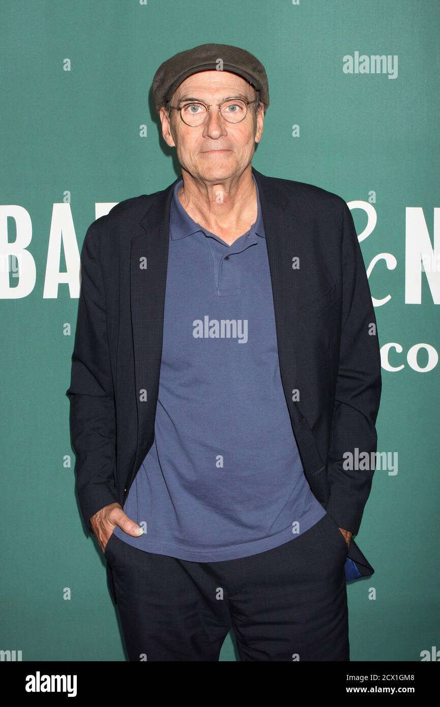 First album signing hi-res stock photography and images - Alamy