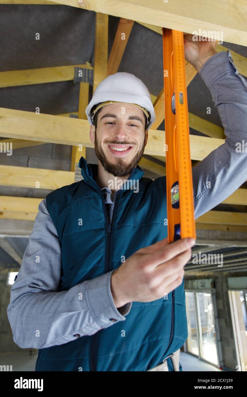 construction man in ceiling Stock Photo - Alamy