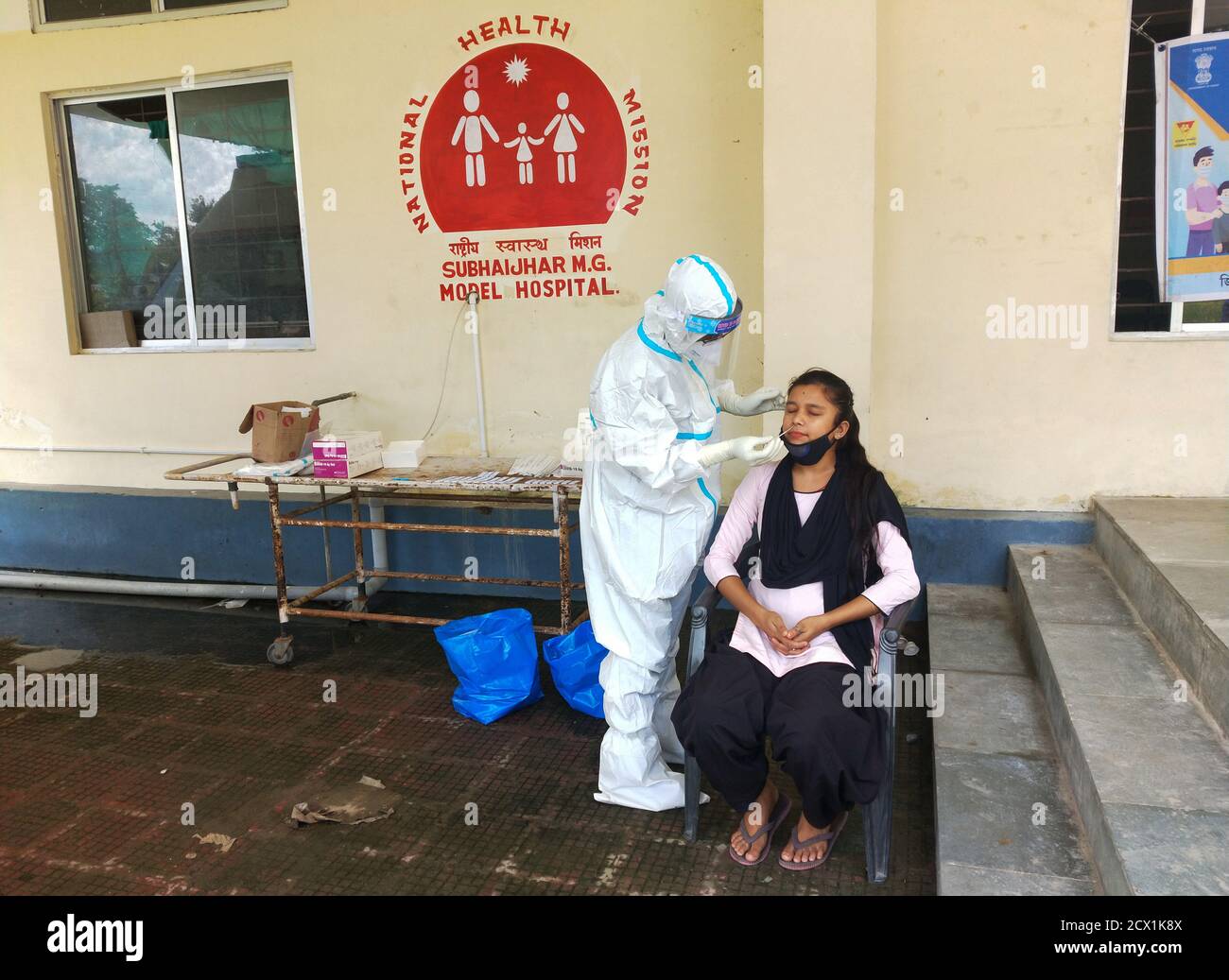 CHIRANG, INDIA. 28 SEPTEMBER 2020. A health worker in personal ...