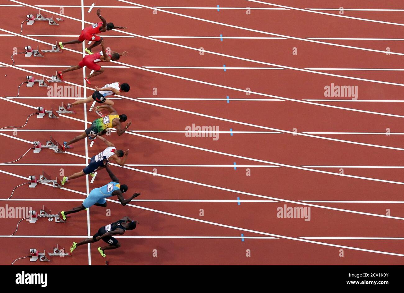 Men's 100m starting blocks olympics hi-res stock photography and images ...
