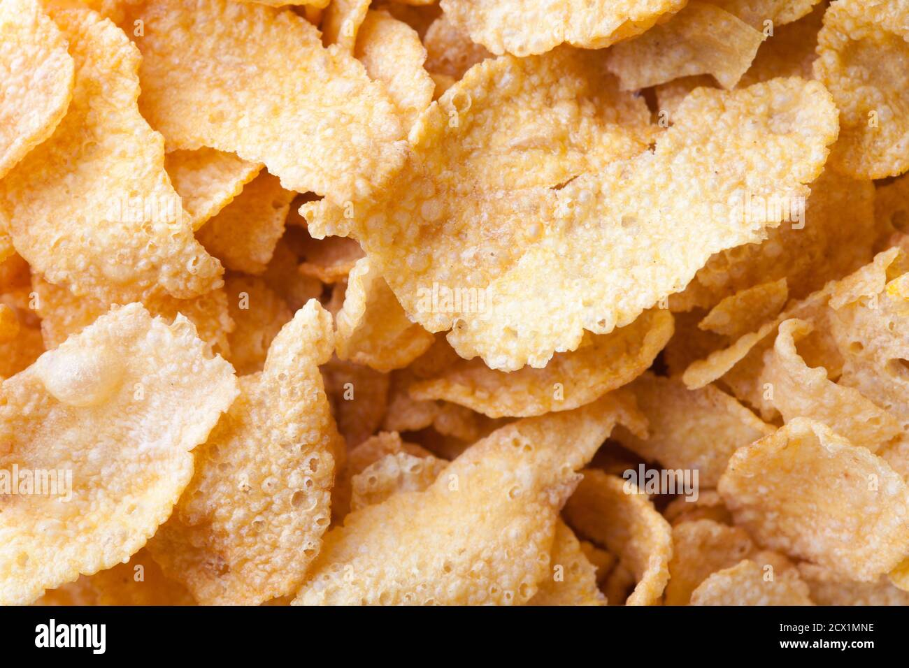 Corn flakes in a bowl close up Stock Photo - Alamy