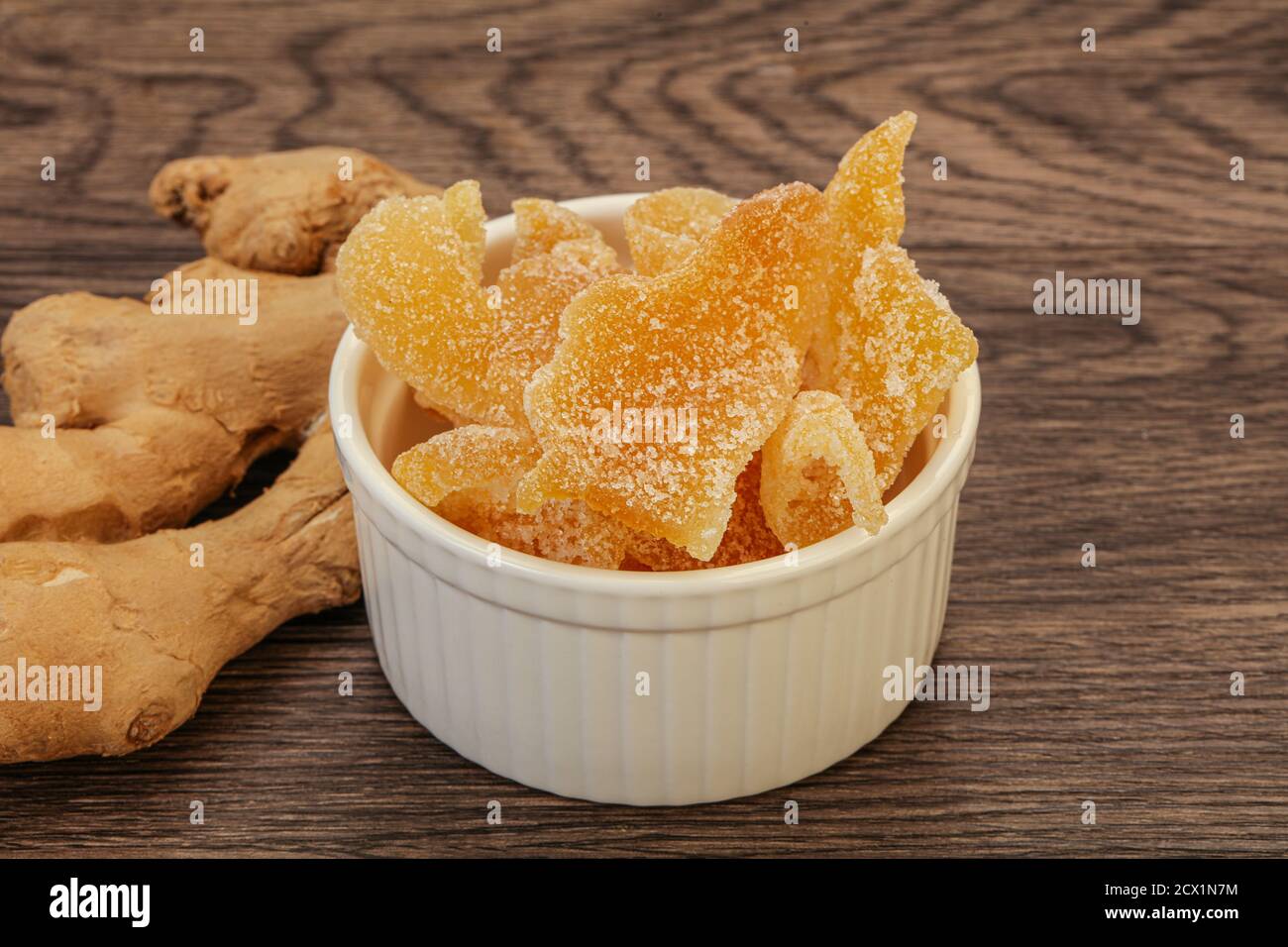 Dry sweet ginger snack in the bowl Stock Photo - Alamy