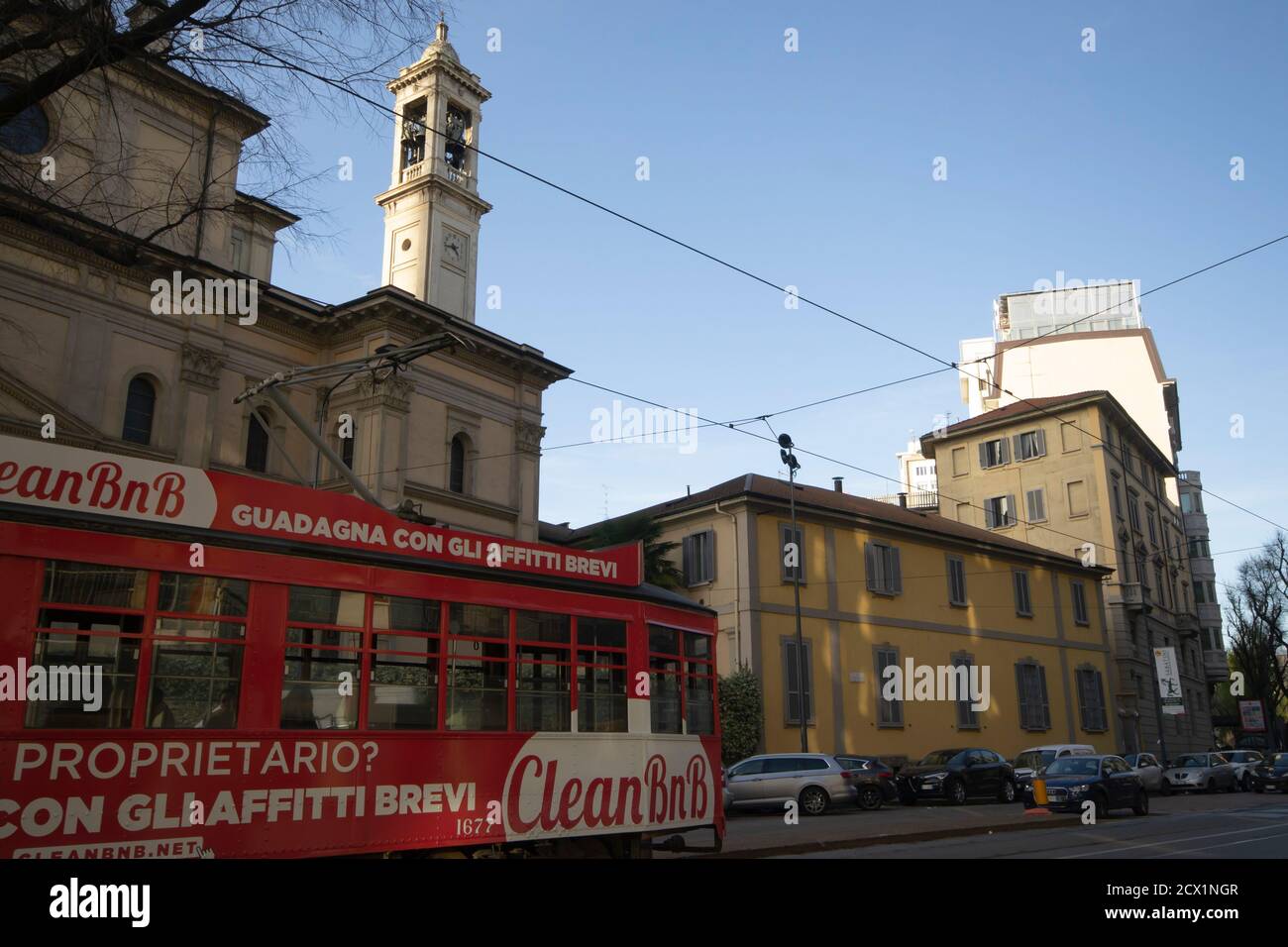 typical traditional tram passes between a street in the center Stock ...