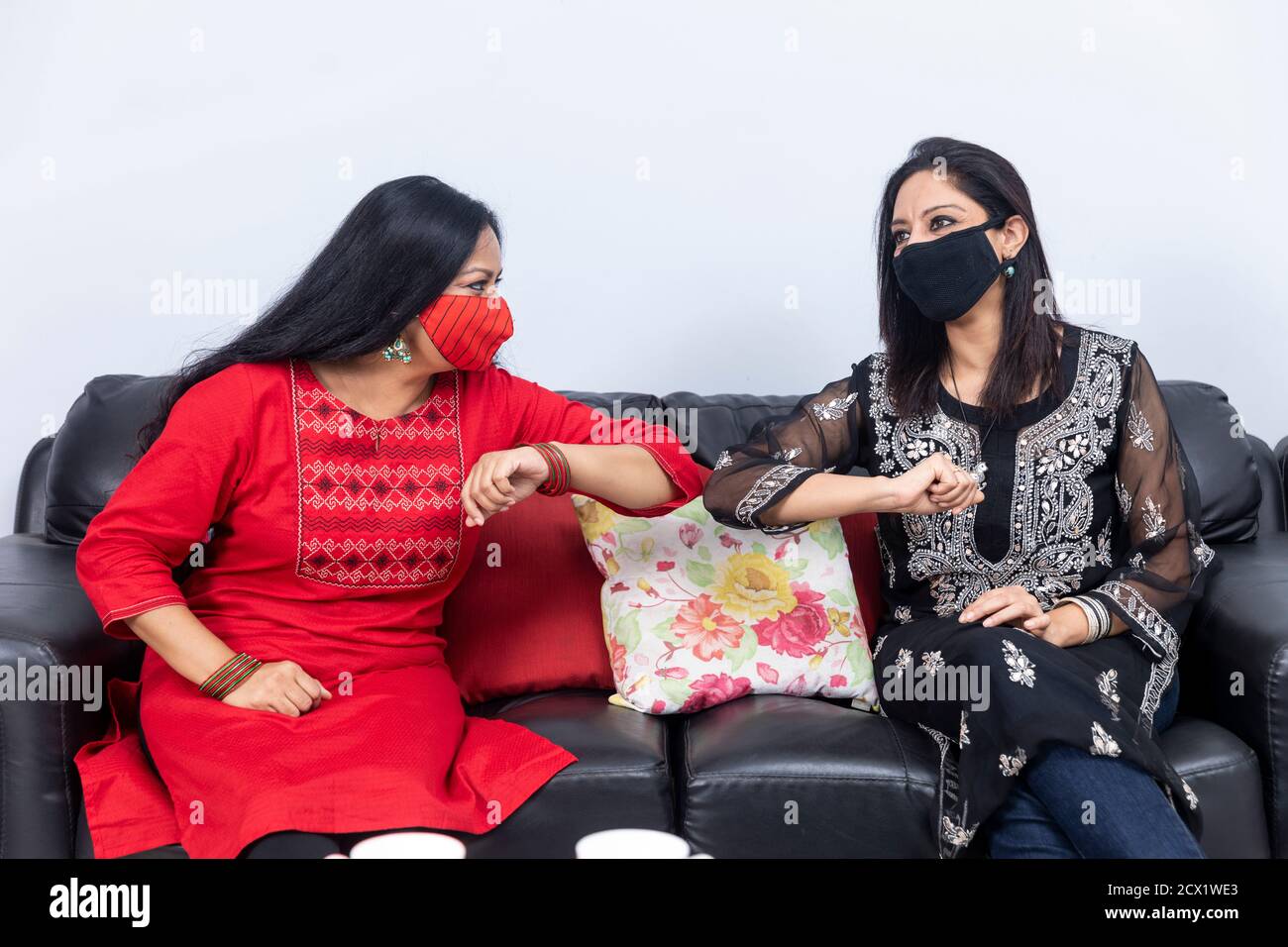 Two women touching each other hi-res stock photography and images - Alamy