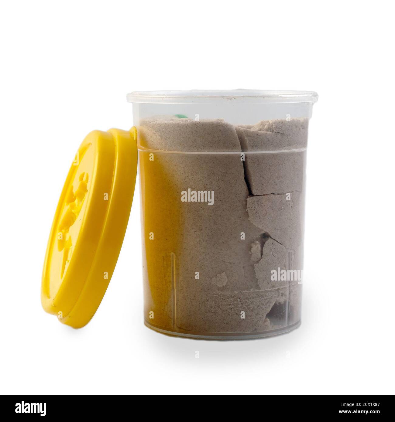 Kinetic sand packaging isolated on white background Stock Photo - Alamy