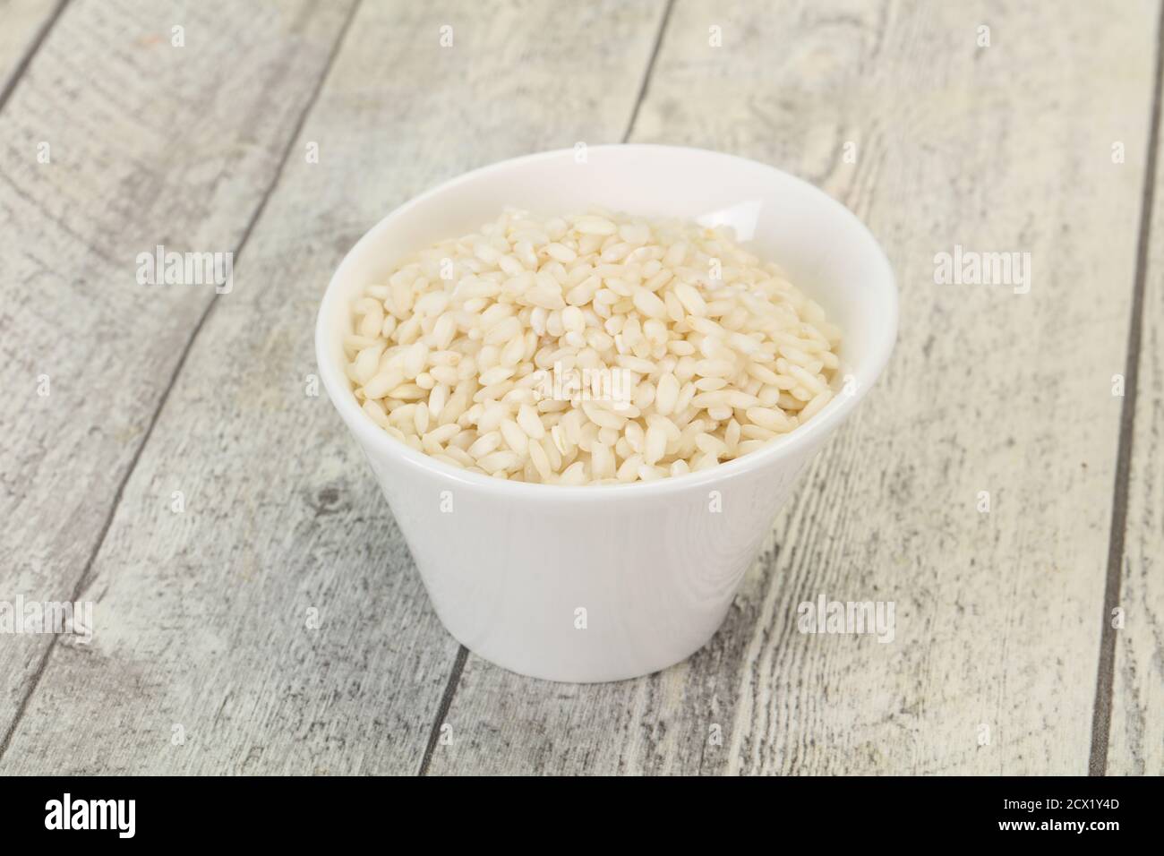 Raw Arborio rice for Italian risotto Stock Photo - Alamy