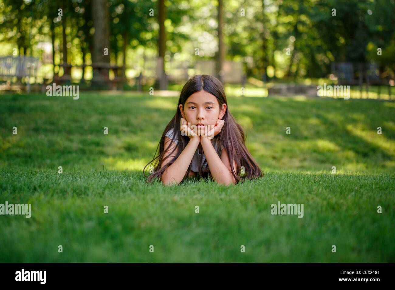 10 year old girl head in hands hi-res stock photography and images - Alamy