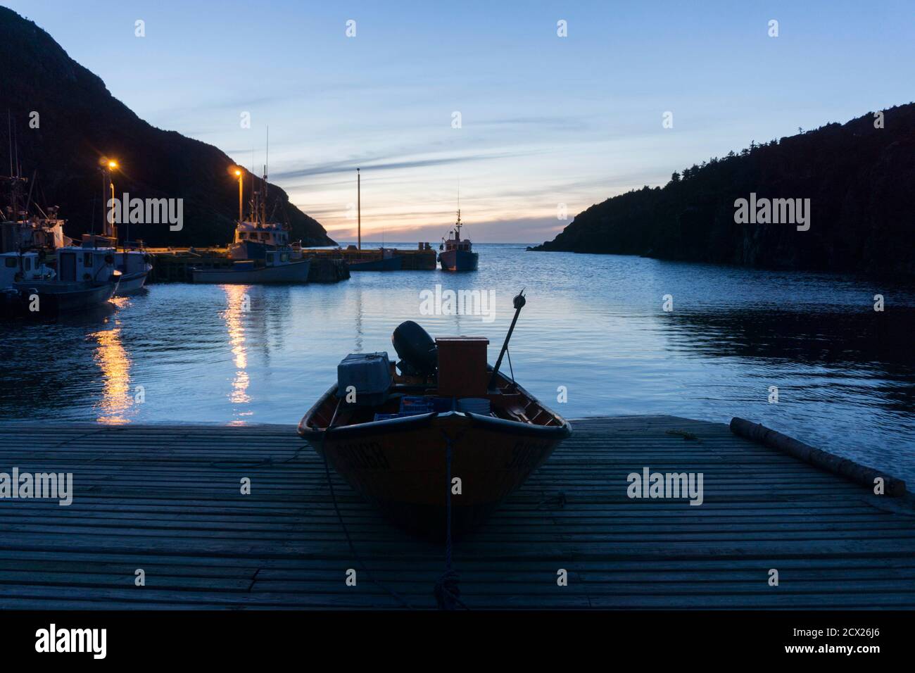 Boat moored on slipway against sky during sunset Stock Photo - Alamy