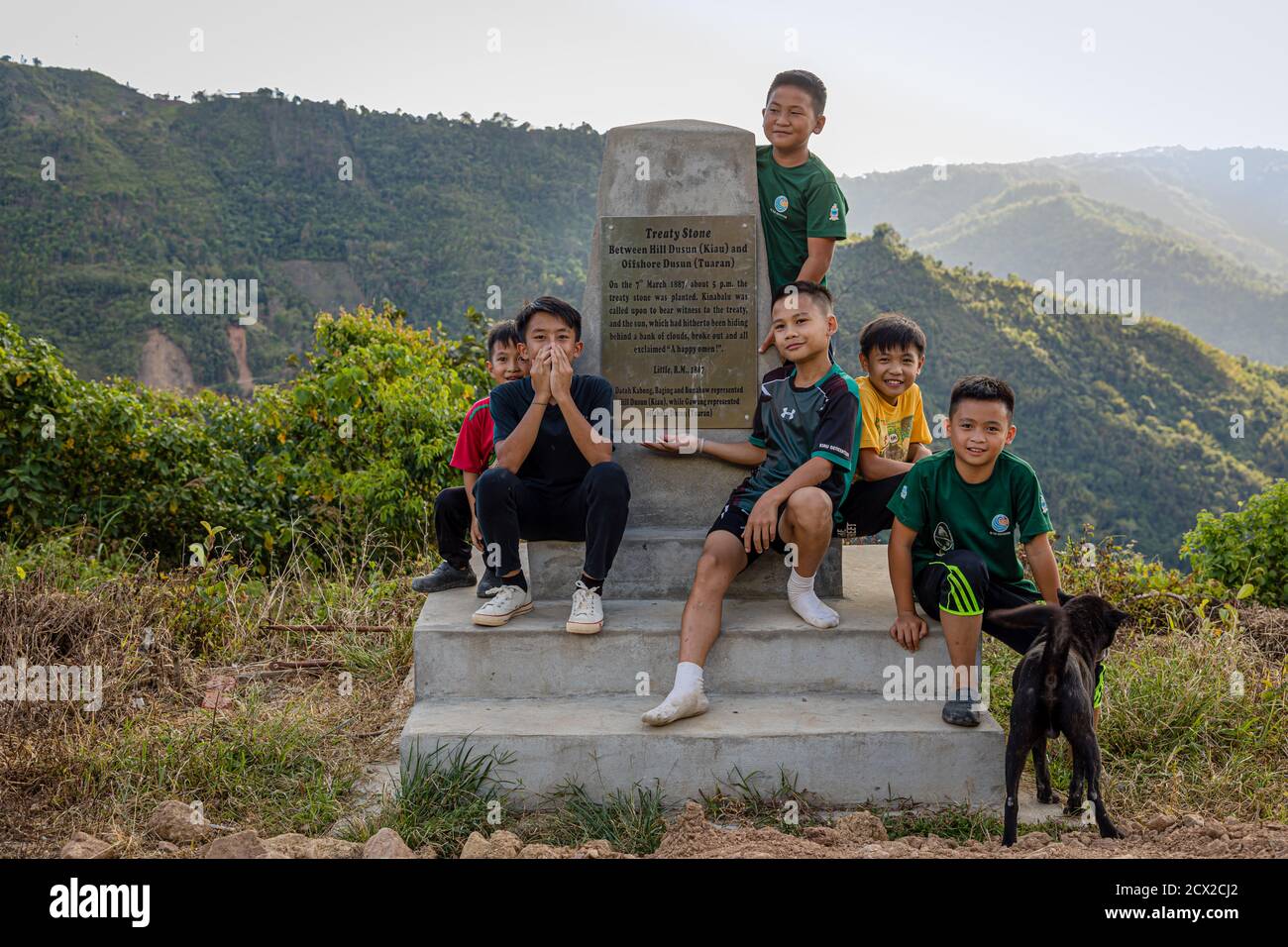 Kiau, Sabah, Malaysia: A band of local boys posing on the Kiau Treaty ...