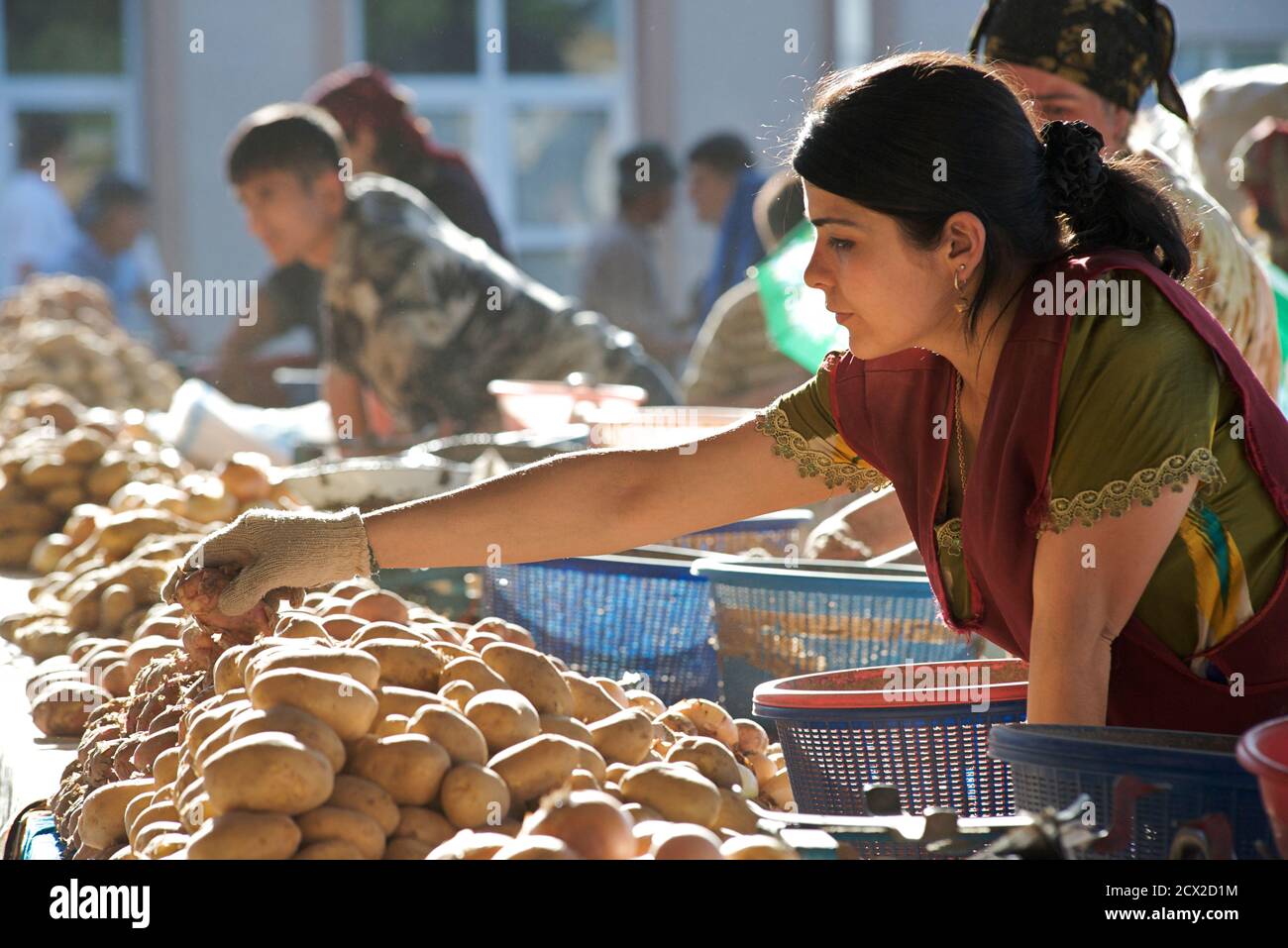 Potato vendor at market, Samarkand, Uzbekistan Stock Photo - Alamy