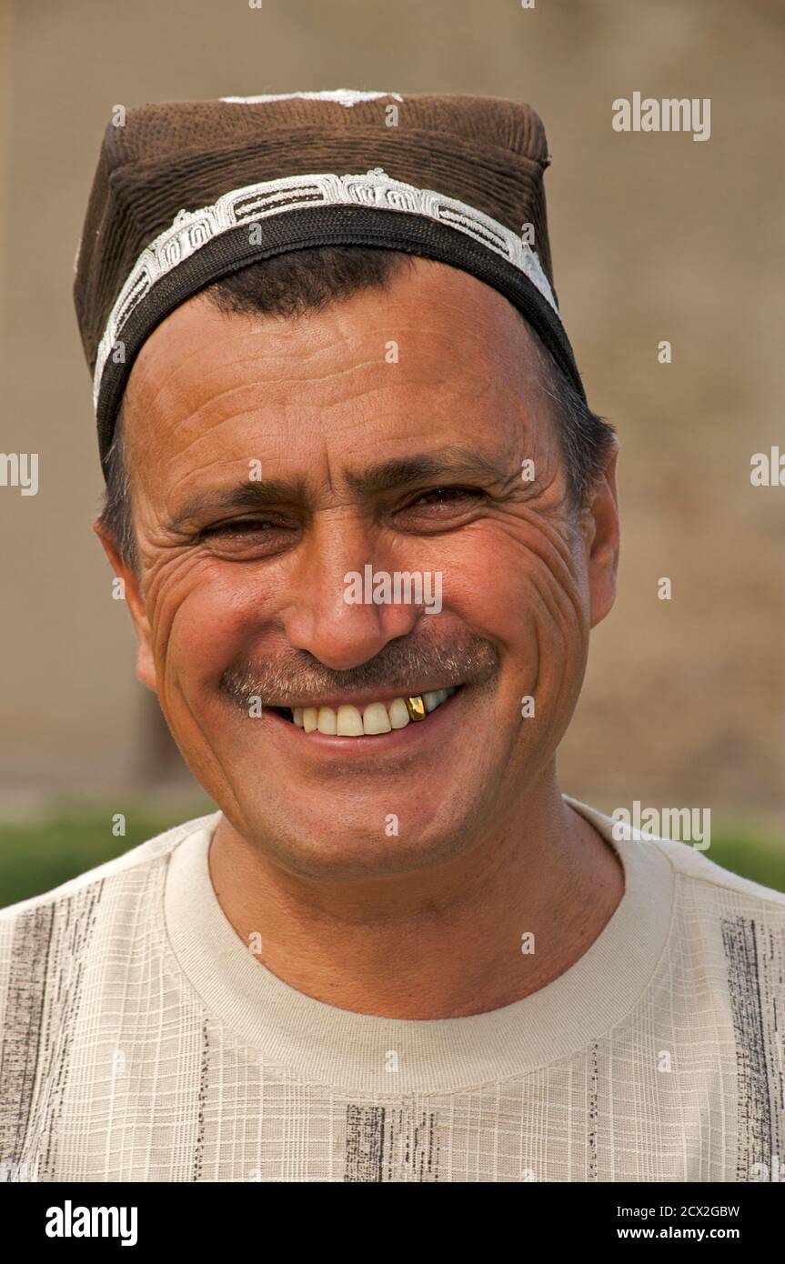 Smiling Uzbeki man in distinctive cap, Bukhara, Uzbekistan Stock Photo ...
