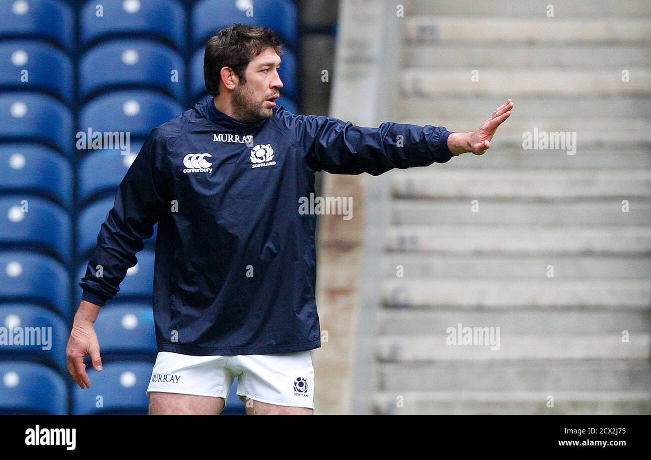 Scotlands nathan hines captains run murrayfield stadium hi-res stock ...