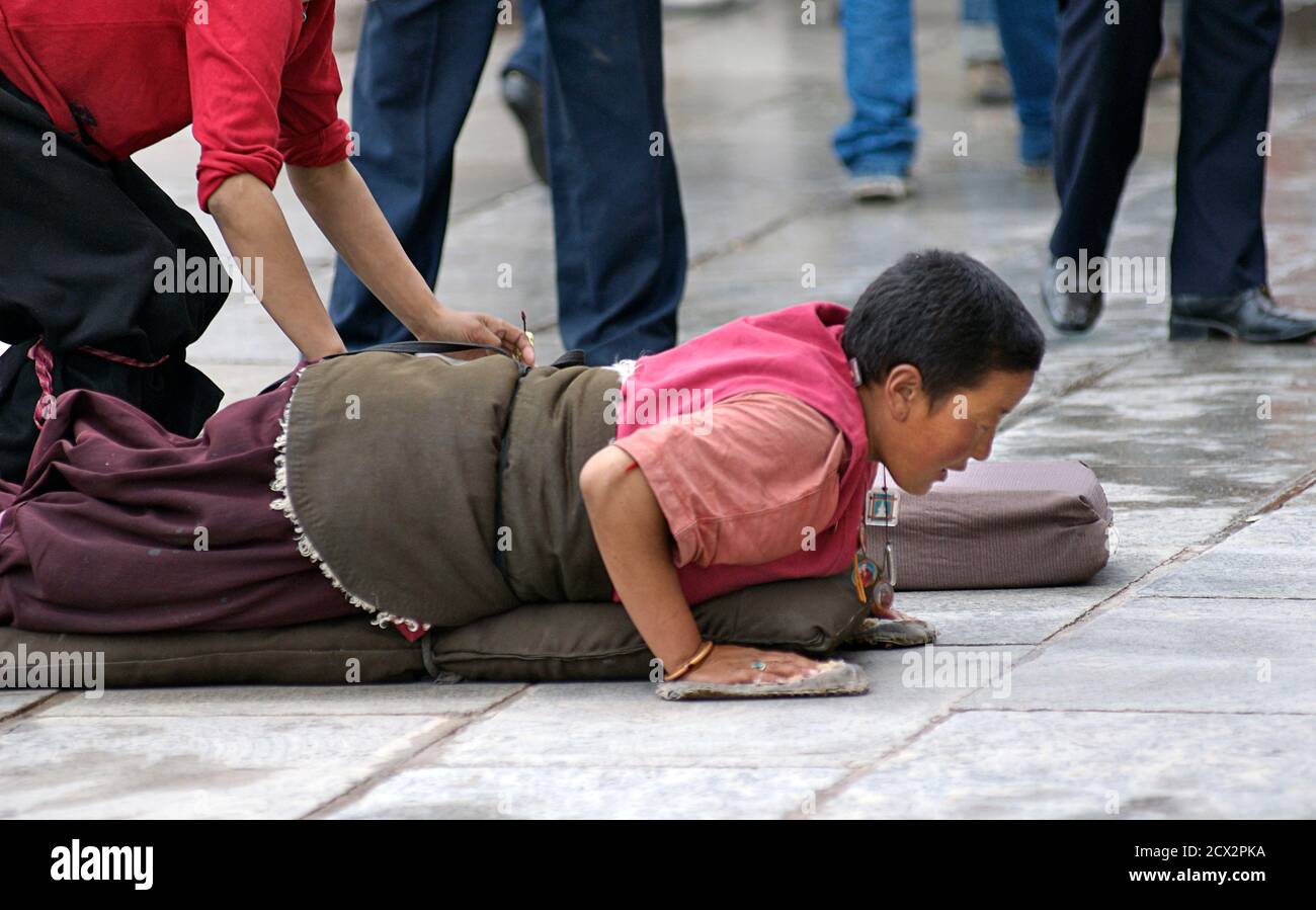 Buddhist pilgrim, Barkor Square, Lhasa, Tibet Stock Photo - Alamy