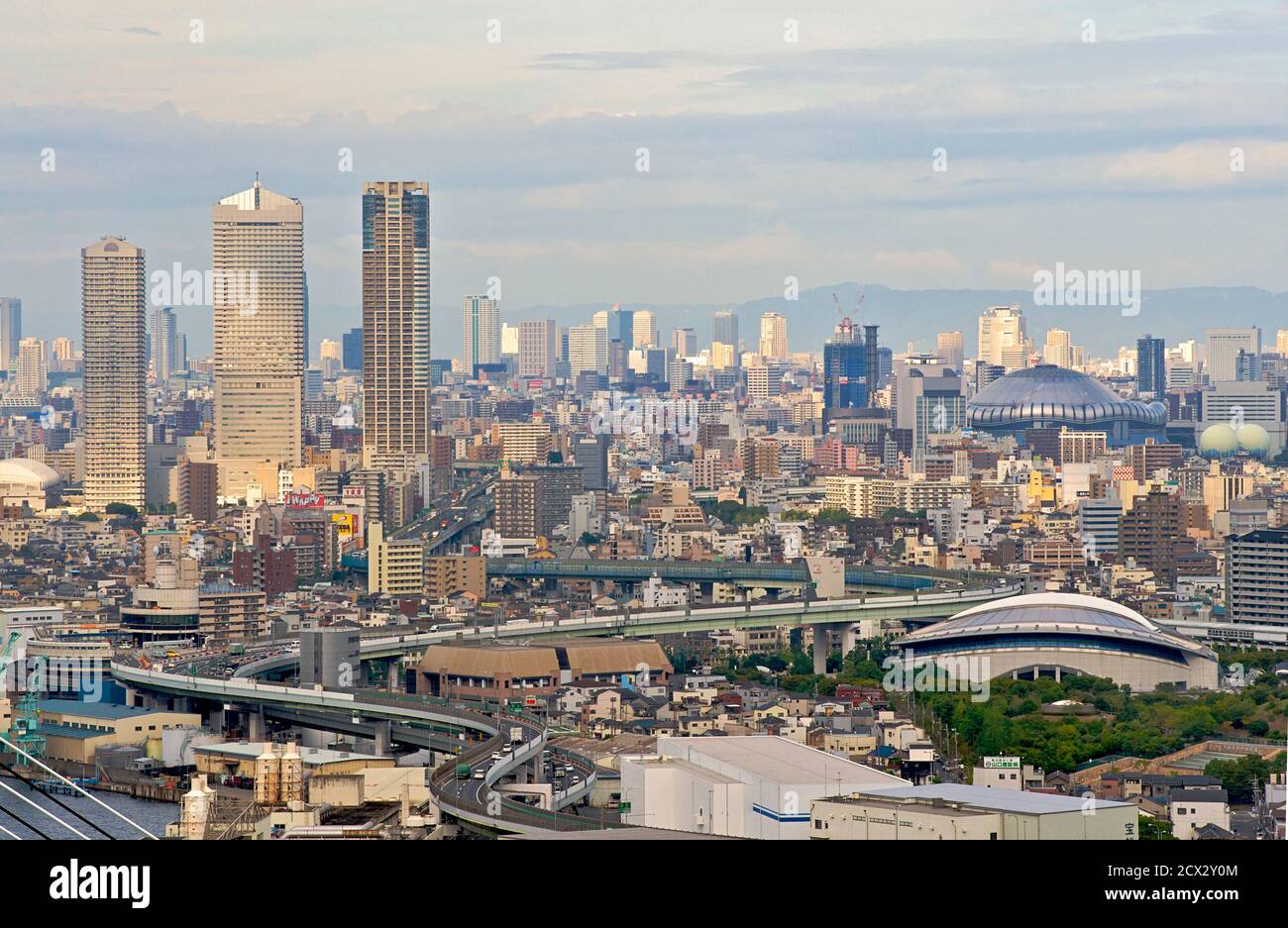 View of Osaka dome beyond and swimming pool to the fore, Osaka Japan ...