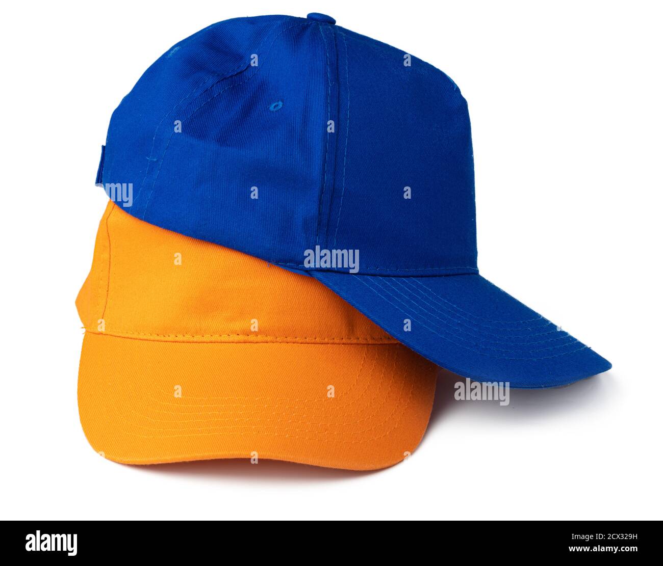 Stack of baseball caps isolated on white background Stock Photo - Alamy