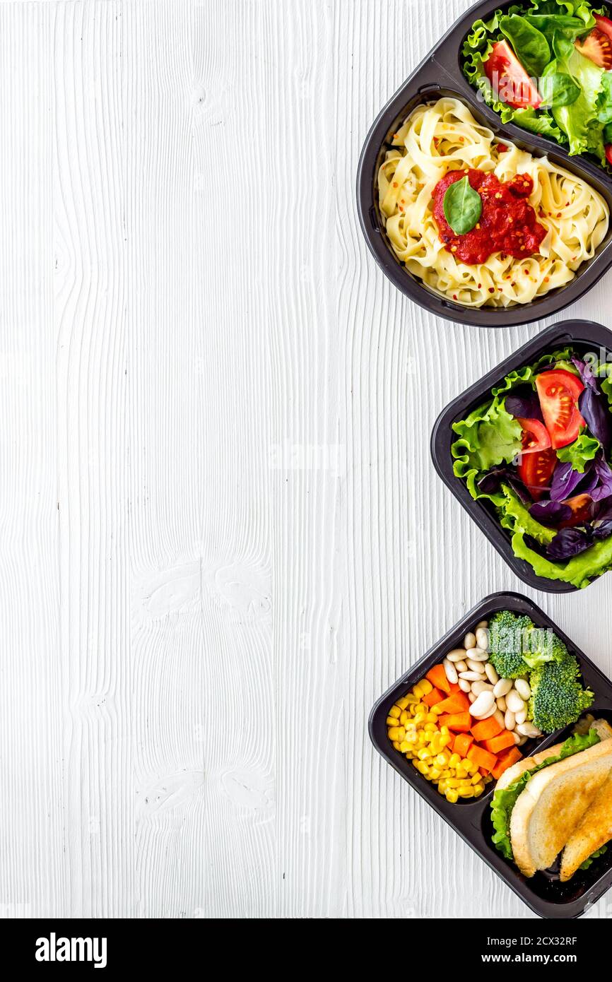 Food delivery background. Take away meal in boxes. Top view Stock Photo ...