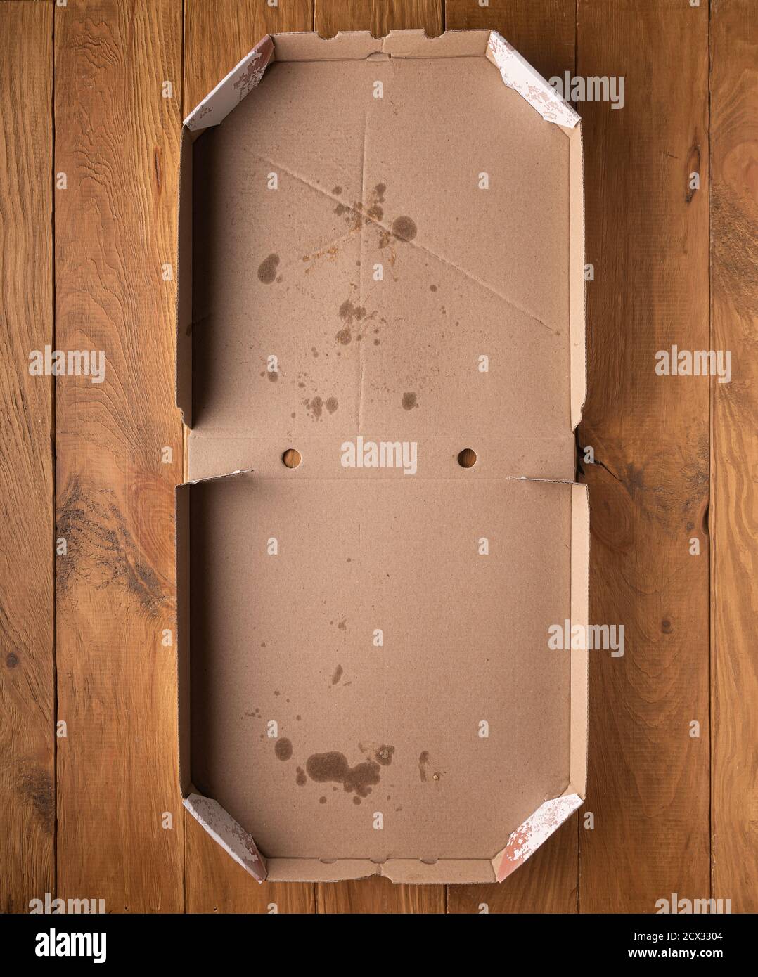 Mock Up With Used Dirty Opened Empty Pizza Box Made Of Paperboard With mock-up-with-used-dirty-opened-empty-pizza-box-made-of-paperboard-with