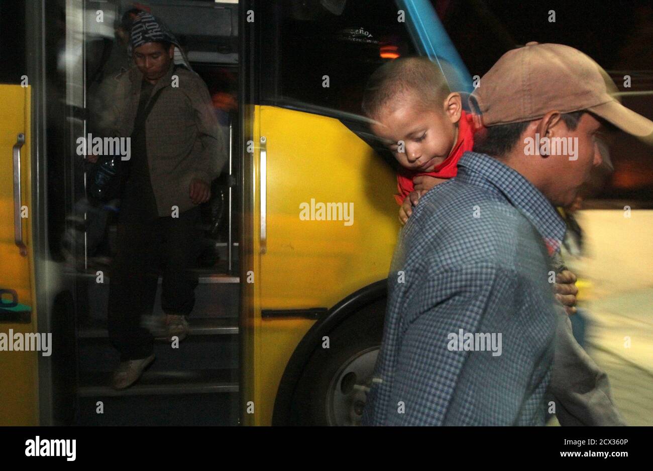 Immigrant getting on bus hi-res stock photography and images - Alamy