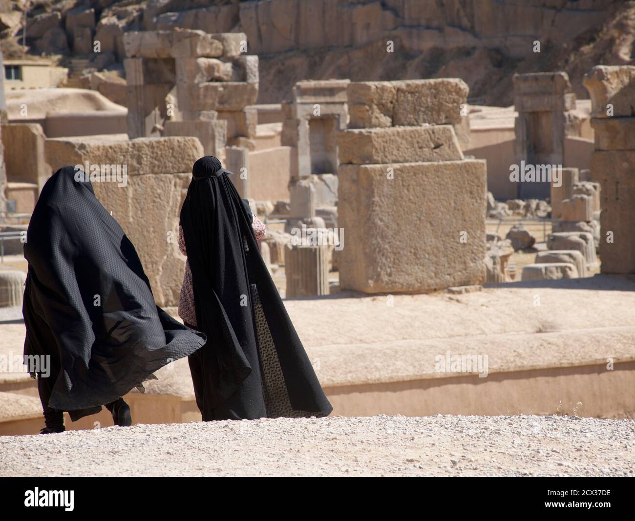 Iranian women wearing black chador at Persepolis, Iran Stock Photo - Alamy