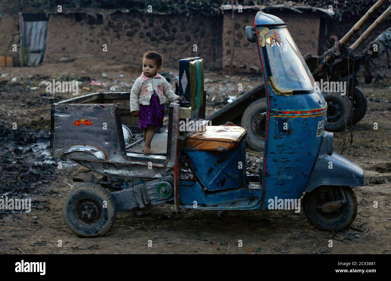 Children in an auto rickshaw hi-res stock photography and images - Alamy