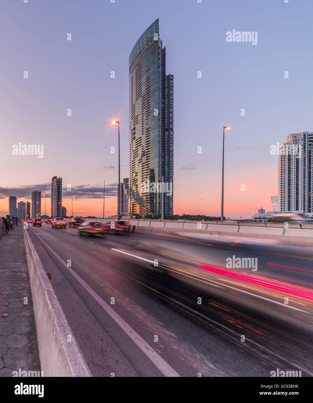 Skyscrapers and Traffic on Taksin Bridge in Bangkok, Thailand at Sunset ...