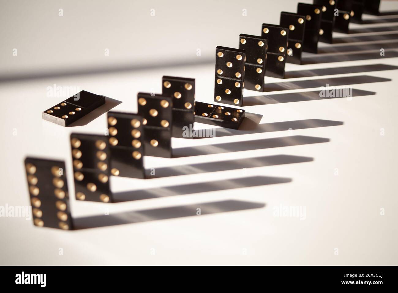 Dominoes in a row hi-res stock photography and images - Alamy