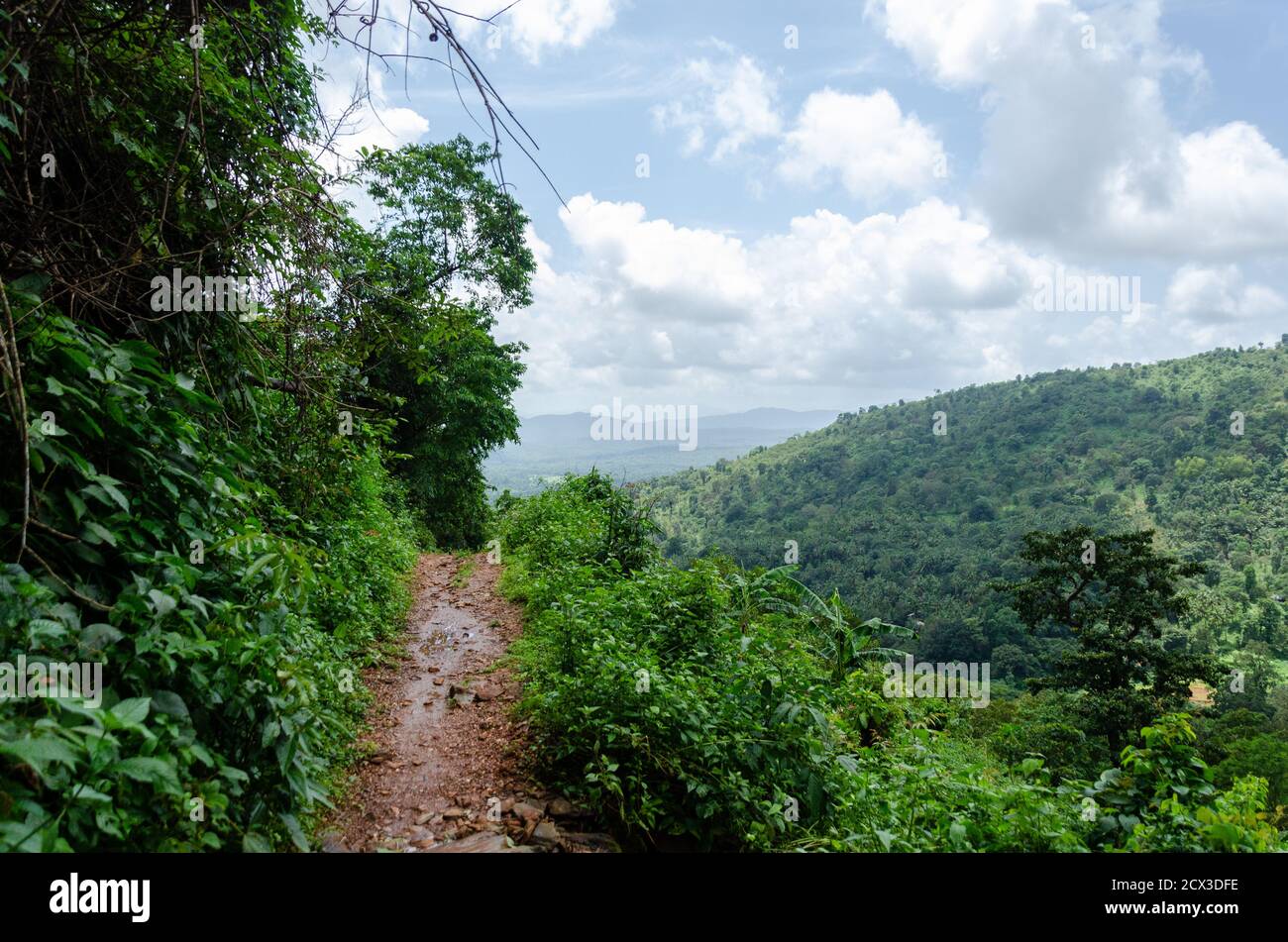 The mountain trekking path that leads to a mountain top waterfall in ...