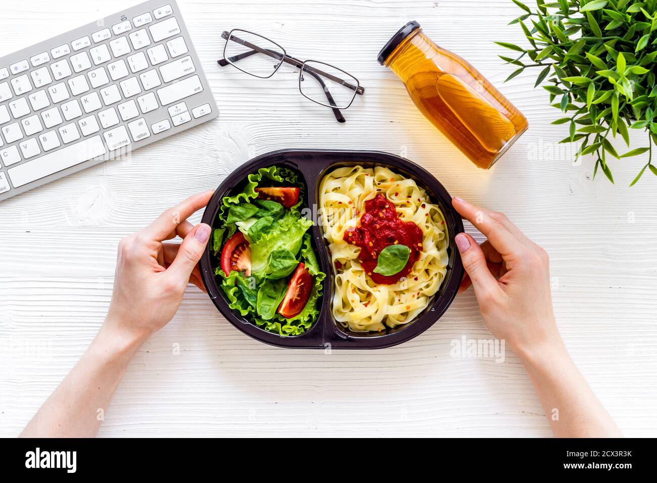 Lunch at workplace. Delivery boxes with meal, top view Stock Photo - Alamy