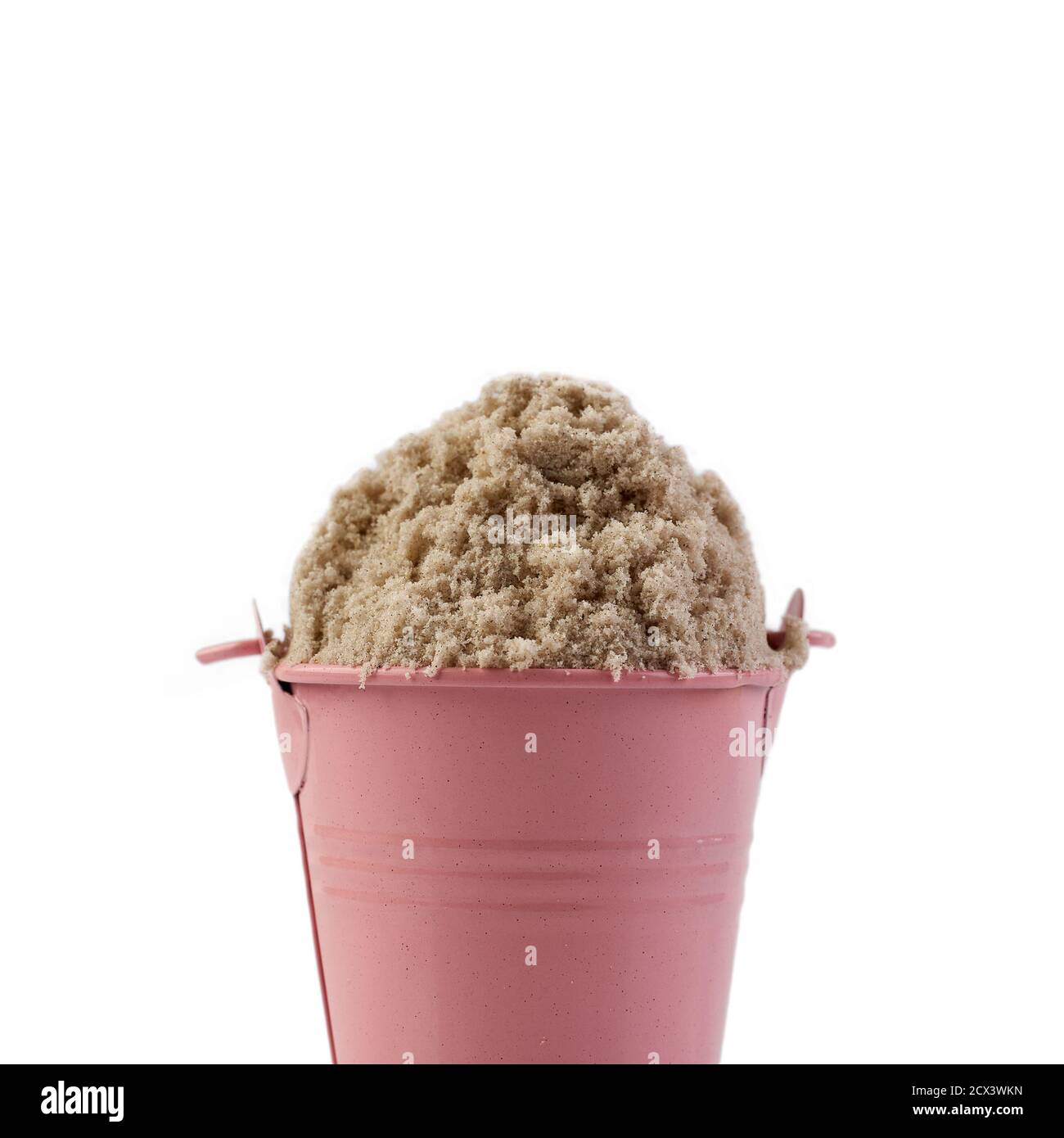 Bucket and sand isolated on white background. Decorative small pink ...