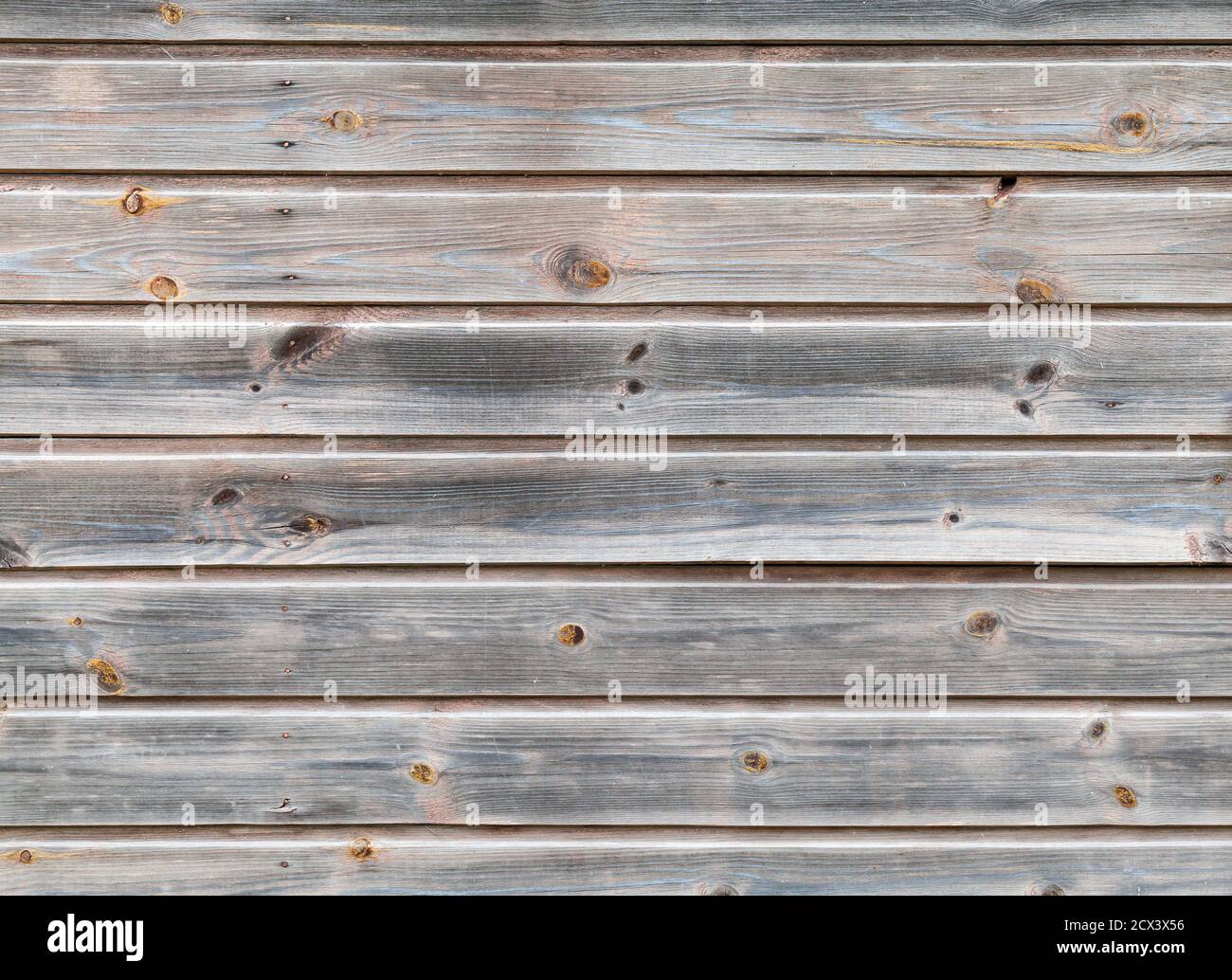 Old dark gray wall made of pine wood planks. Front view, background ...