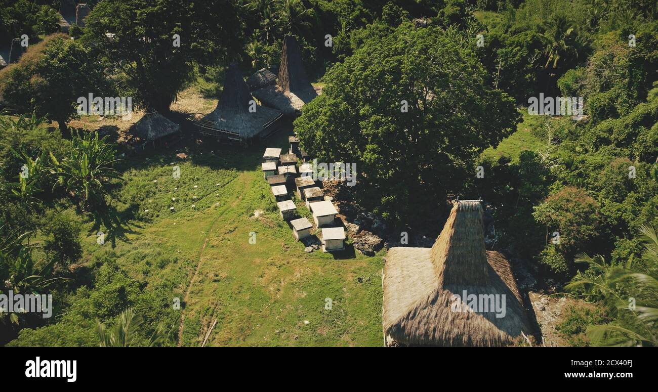Traditional village with ornately carved roofs houses aerial view ...