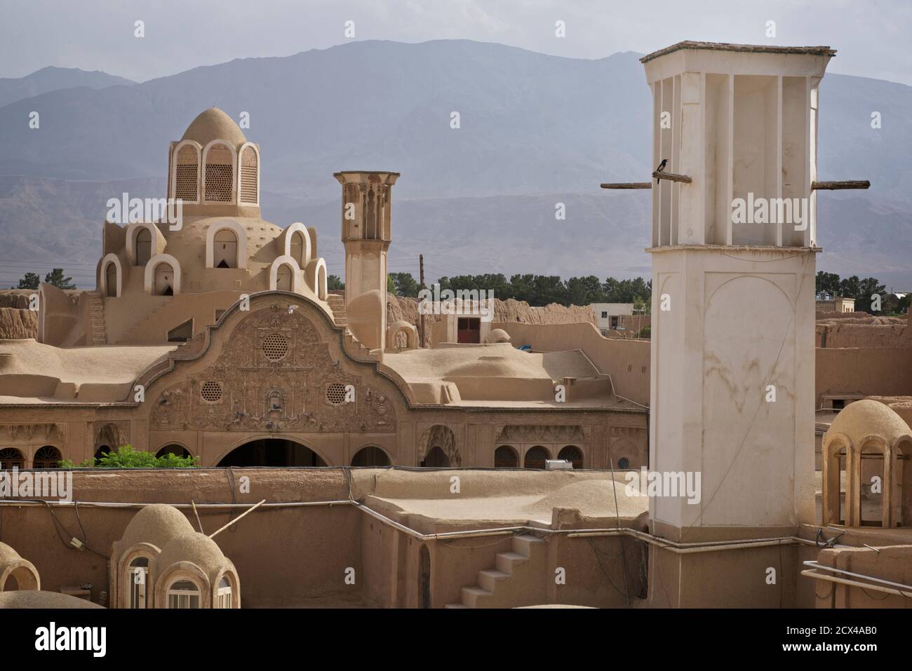 Ornate roof architecture of the Borujerdi historic house facade and ...