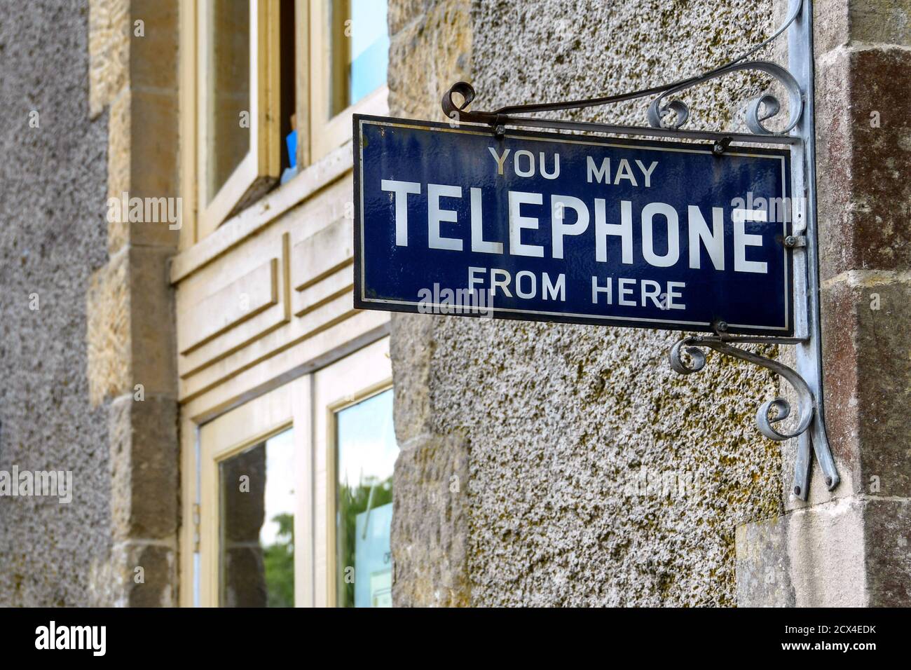 CRANMORE, ENGLAND - JULY 2019: Vintage telephone sign on the station ...