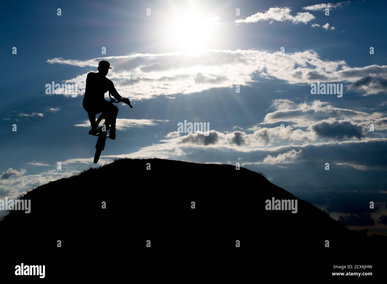 Shadow bike man Stock Photo - Alamy