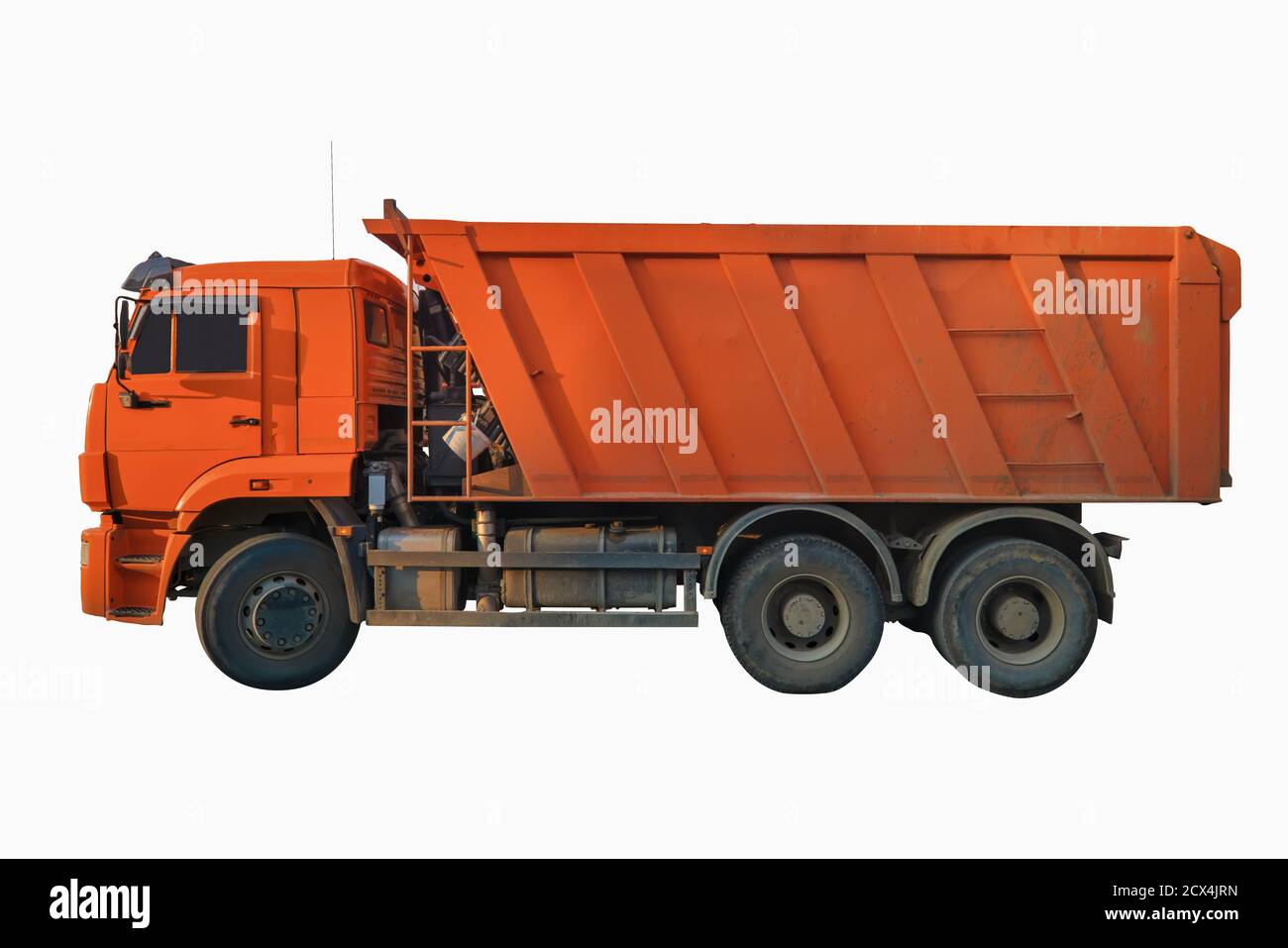 Dump truck orange color isolate on white background Stock Photo - Alamy