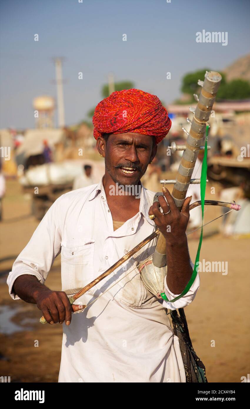 Rajasthani musician with a ravanahatha at Pushkar Fair, Rajasthan ...
