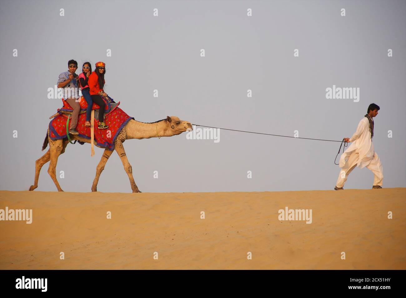 Camel riding in the Thar Desert at Sam, Rajasthan, India Stock Photo ...