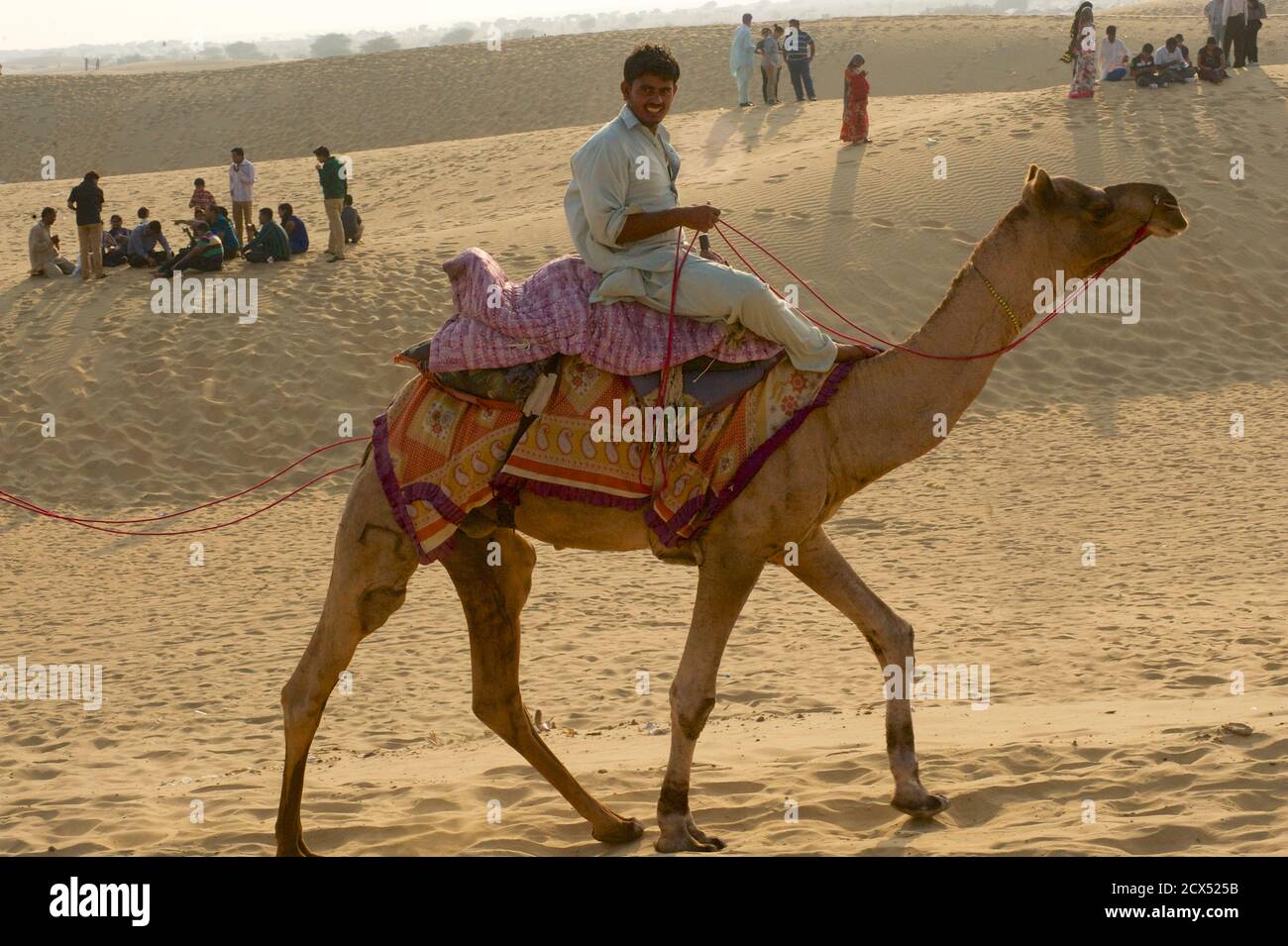 Camel riding in the Thar Desert at Sam, Rajasthan, India Stock Photo ...