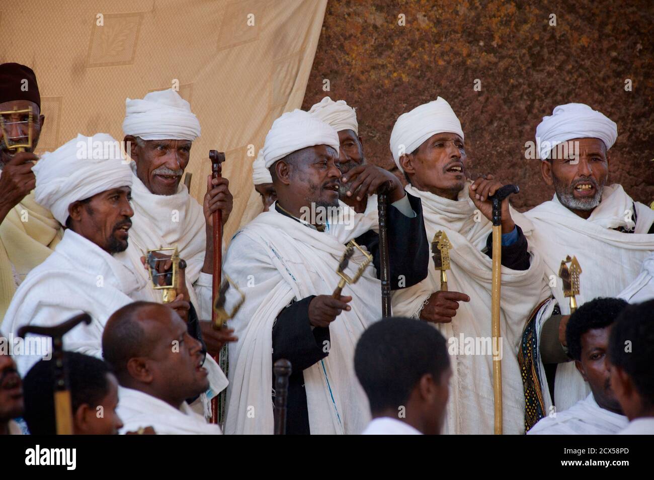 Ethiopian priests with canes and sistrums chanting for Easter ...