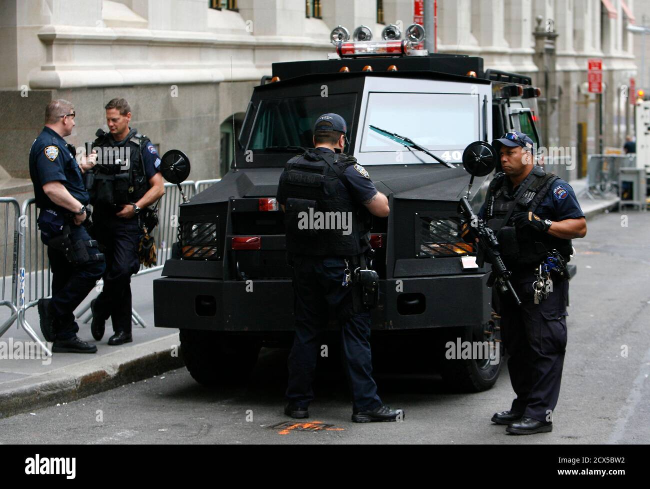 Heavily armed police officers stand hi-res stock photography and images ...
