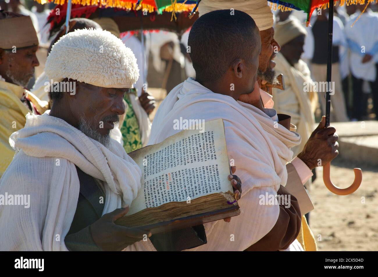 Ethiopian priests attending a funeral in their liturgical robes ...