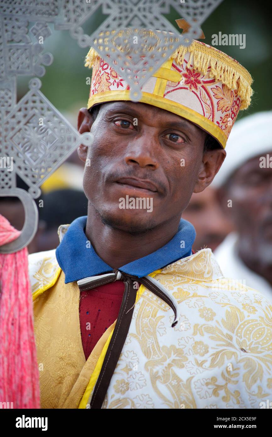 Ethiopian priest with orthodox Christian cross. Palm Sunday ...