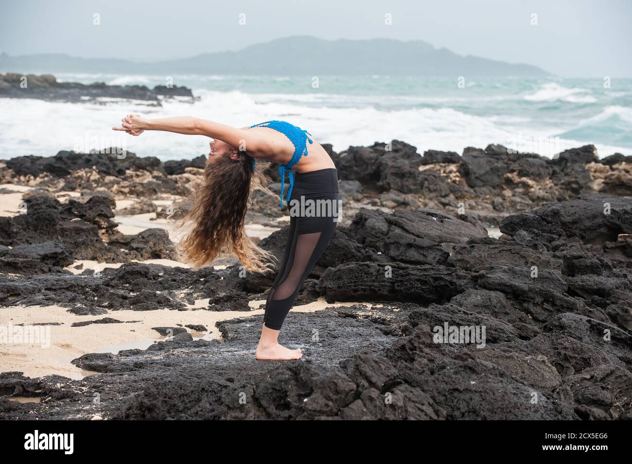 Yoga at the beach Stock Photo - Alamy